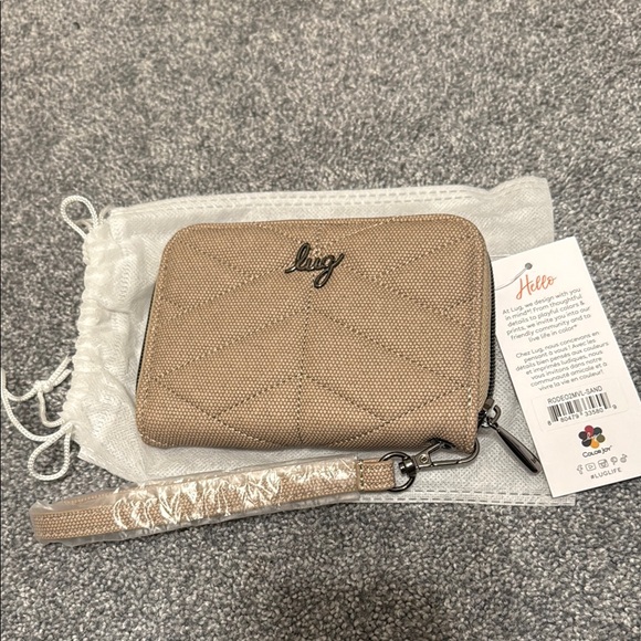 lug | Bags | Lug Rodeo Matte Luxe Vl Rfid Wallet Sand Taupe | Poshmark